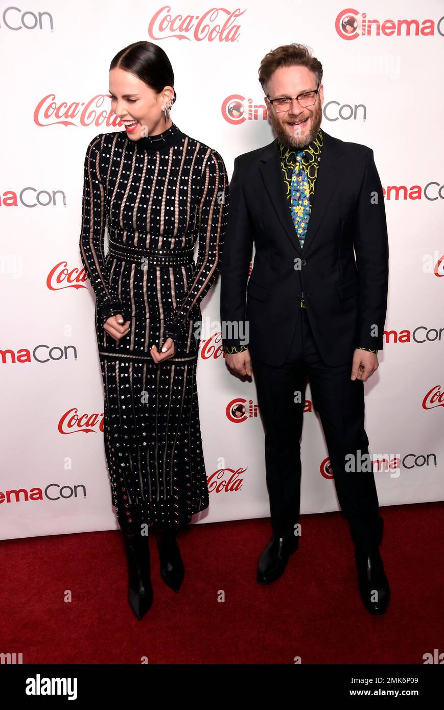 Charlize Theron, left, and Seth Rogen, recipients of the CinemaCon ...