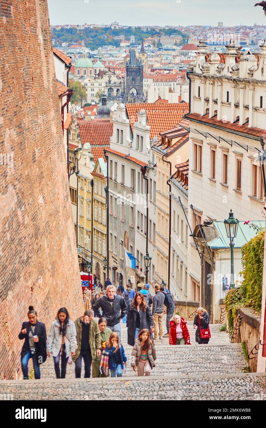 Facades of old buildings in downtown of Prague with tile rooftops ...