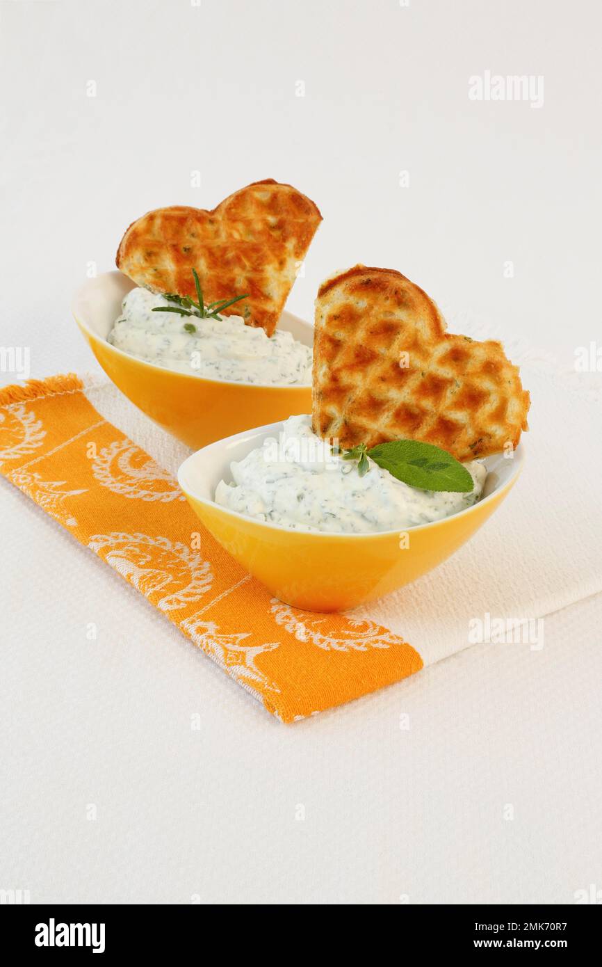South German cuisine, waffles with herb curd in small bowls, heart ...