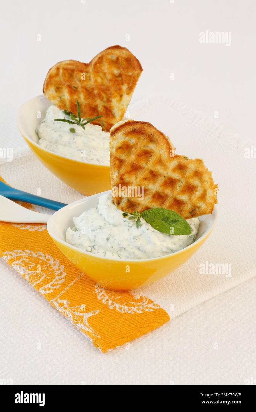 South German cuisine, waffles with herb curd in small bowls, heart ...