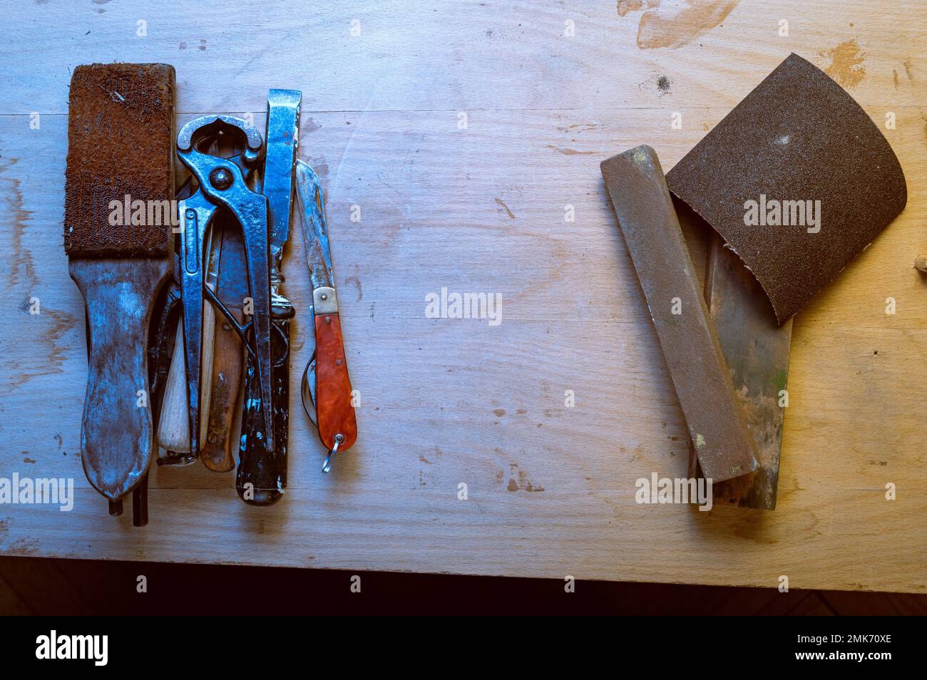 Old tools on the table. Tools for repair. Workshop and service. Tools ...