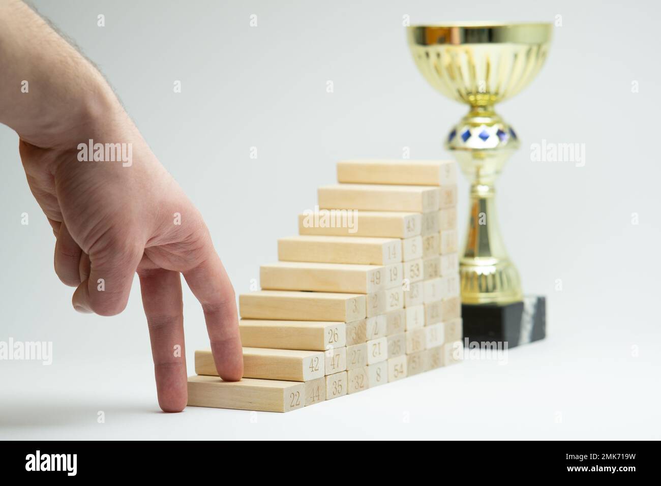 Human hand climbing stairs on white background, concept for growth in ...