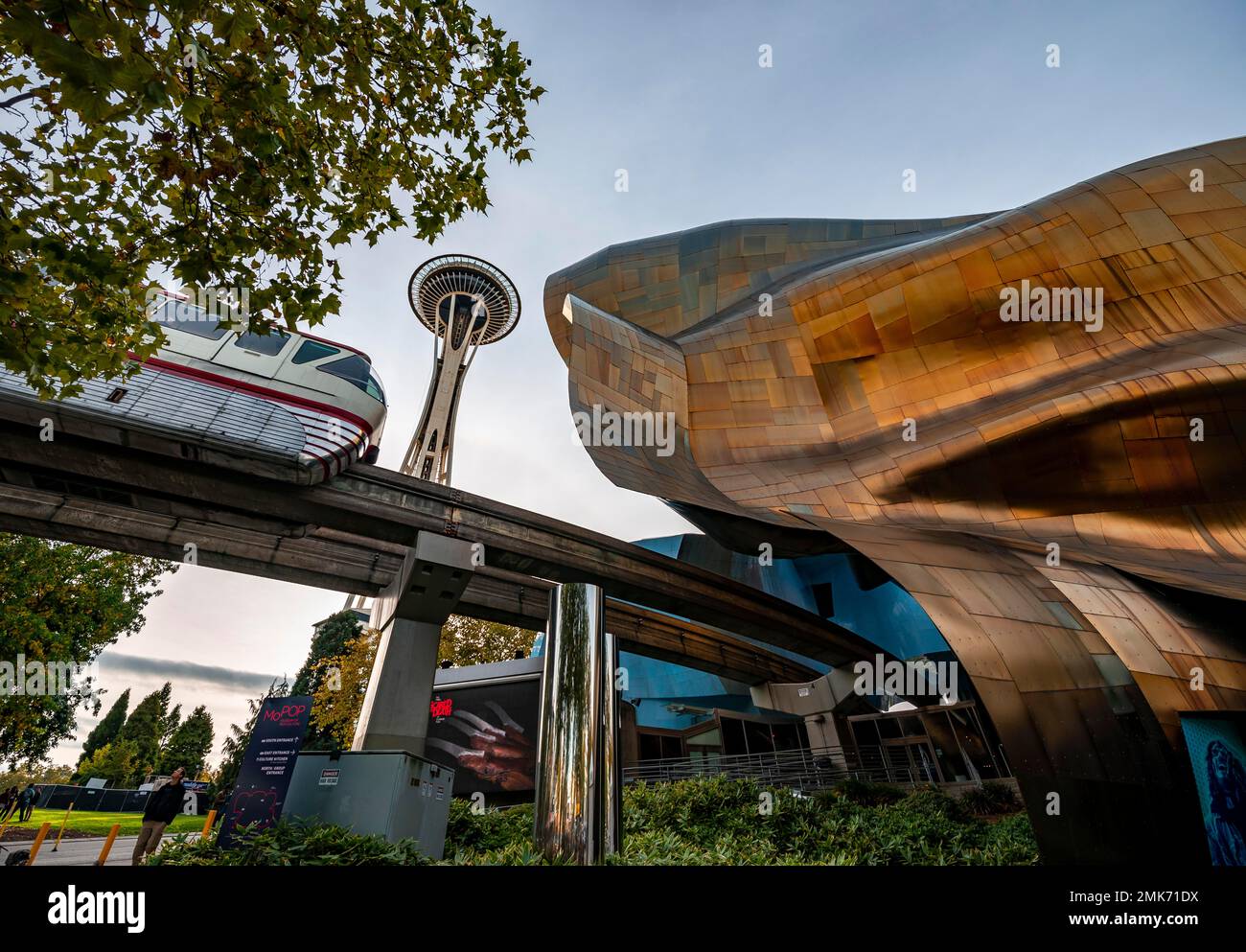 Monorail track and Space Needle, Corrugated coloured exterior facade of ...