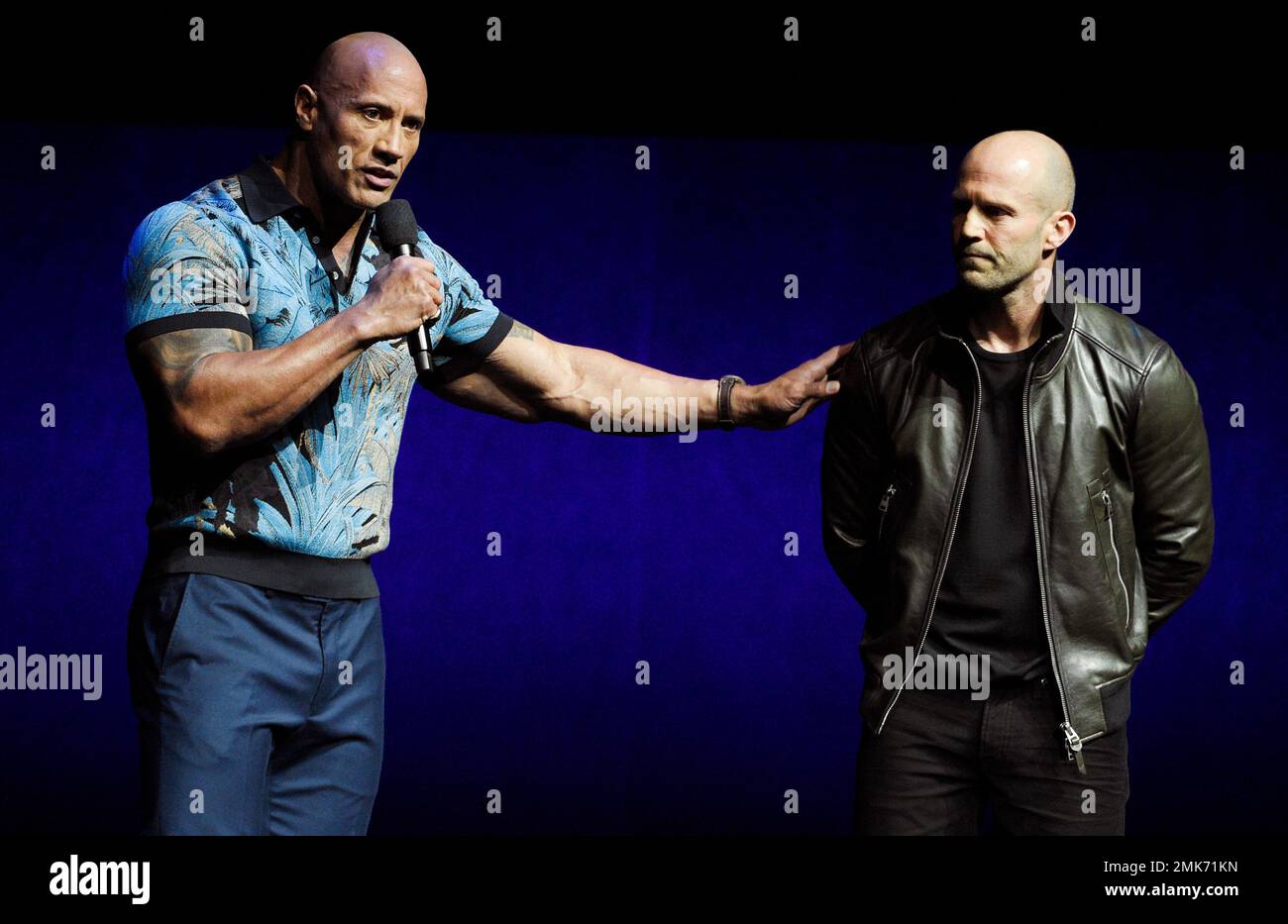 Dwayne Johnson, left, and Jason Statham, cast members in the upcoming film "Fast and Furious ...