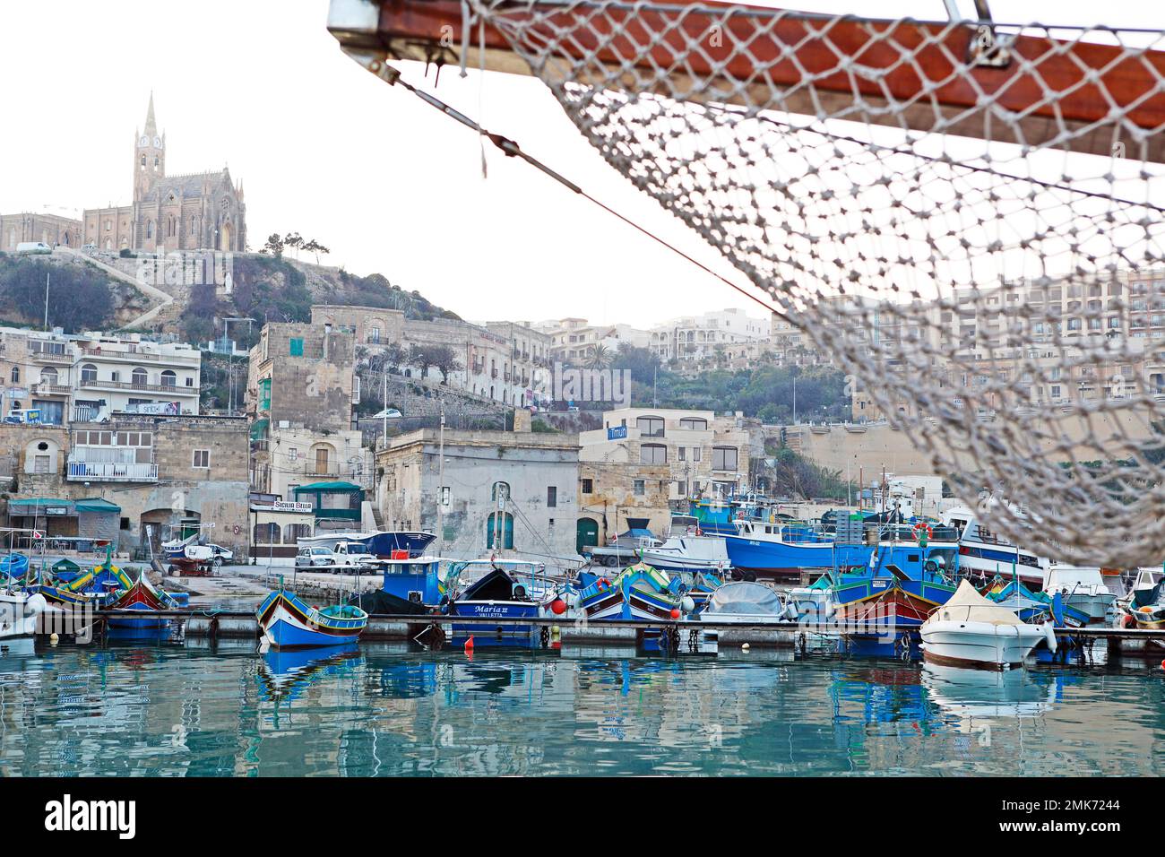 Mgarr fishing harbour, Ghajnsielem church in the back, Gozo, Males ...