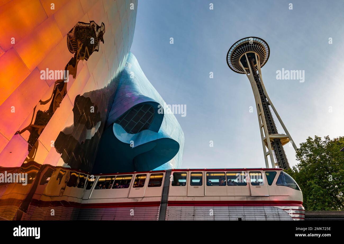 Monorail train passing through museum, Corrugated coloured exterior ...
