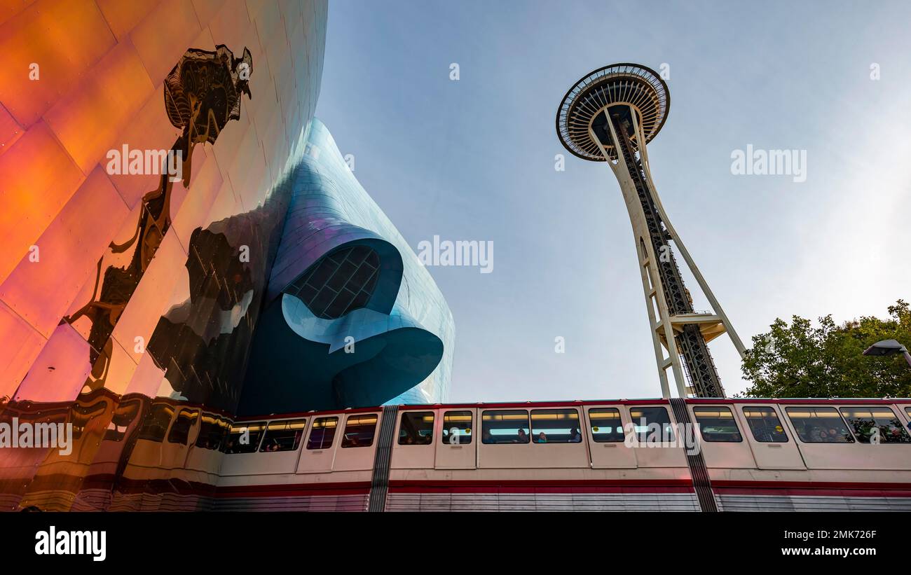 Monorail train passing through museum, Corrugated coloured exterior ...