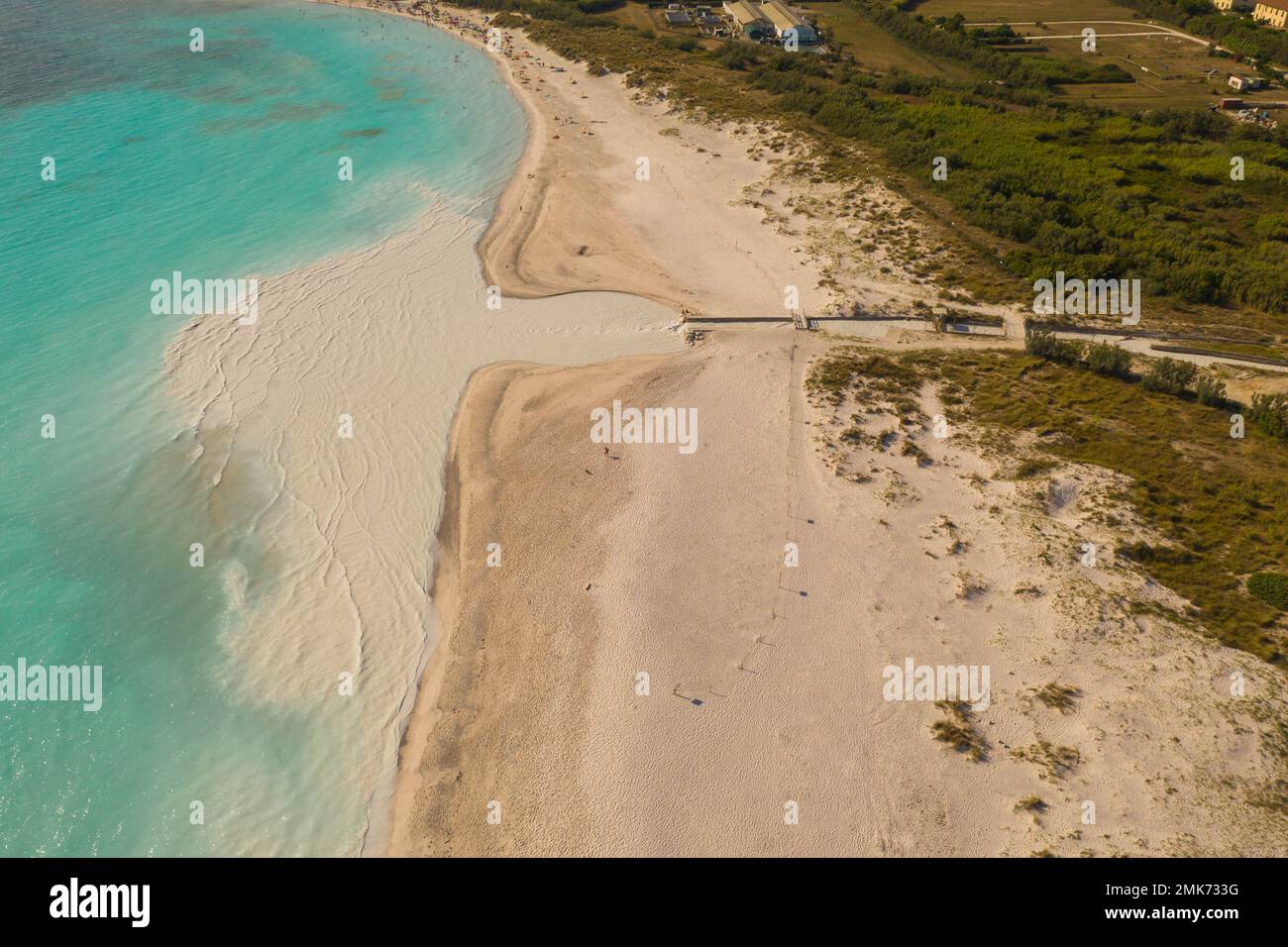 Drone photography of river ending in ocean dumping factory water during ...