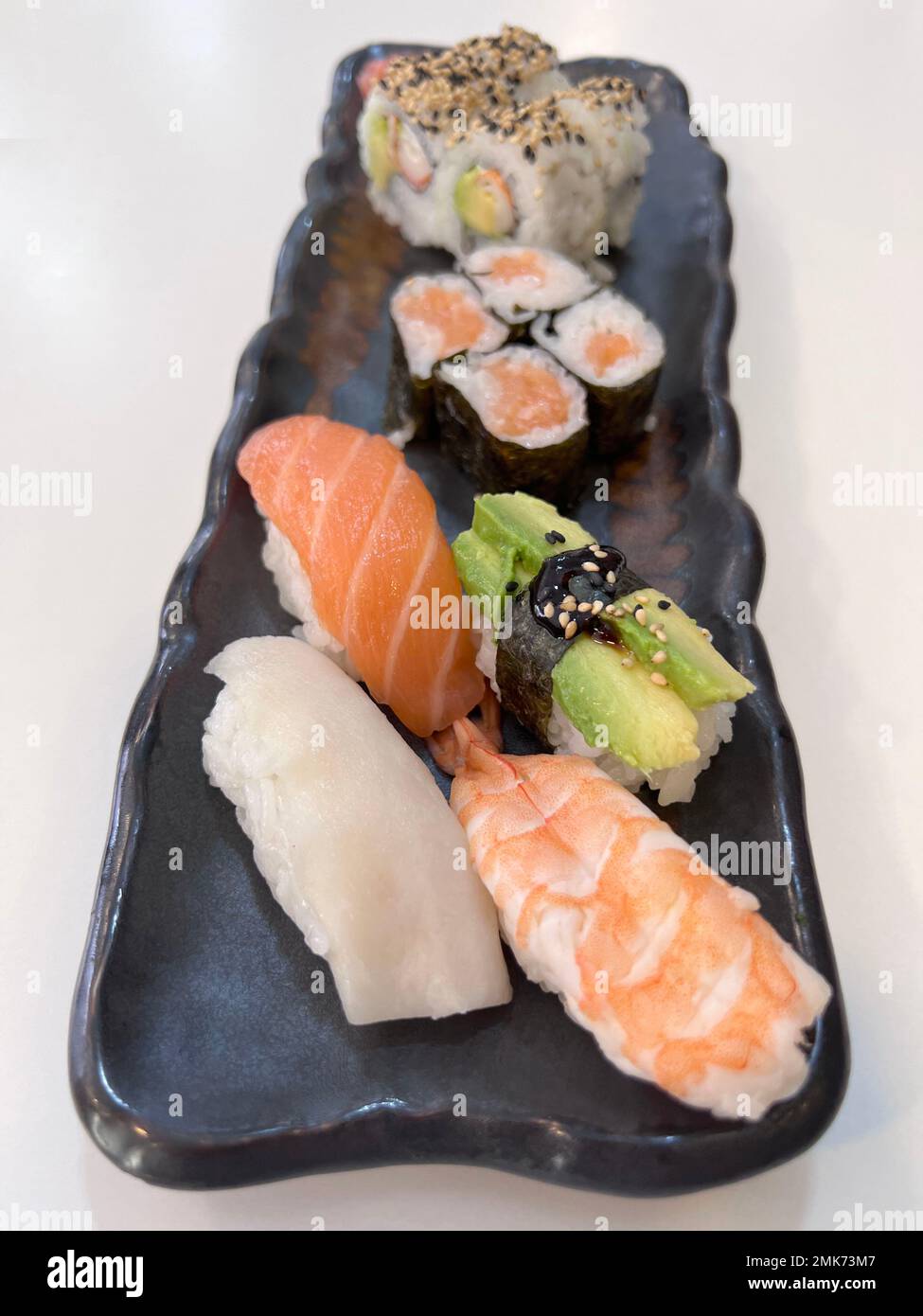 Dish service with Shusi for your consumption Stock Photo - Alamy