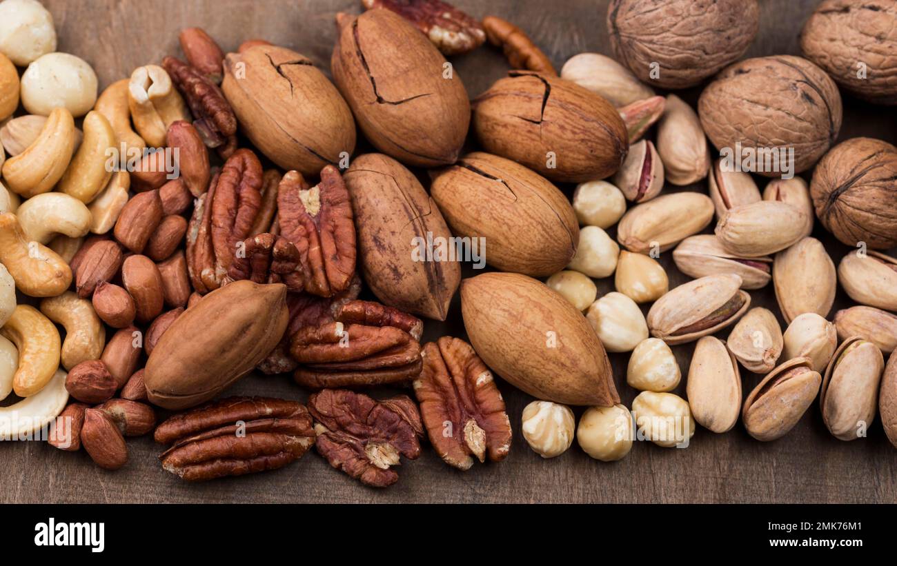 top view various organic nuts snack background. High resolution photo ...