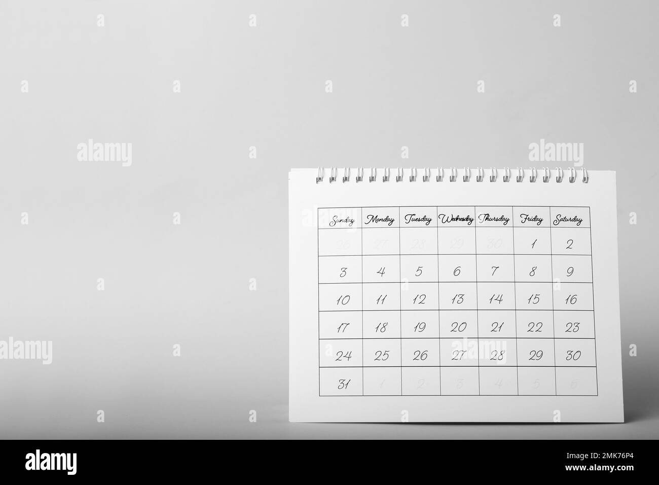 Paper calendar on grey background, space for text. Planning concept ...