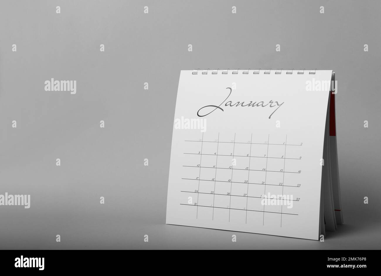 Paper calendar on grey background, space for text. Planning concept ...