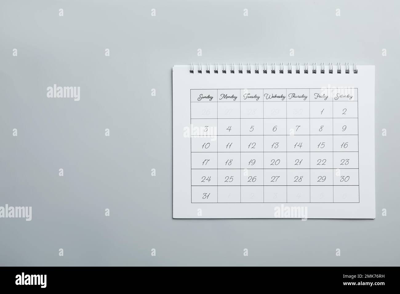 Paper calendar on light grey background, top view. Space for text Stock ...