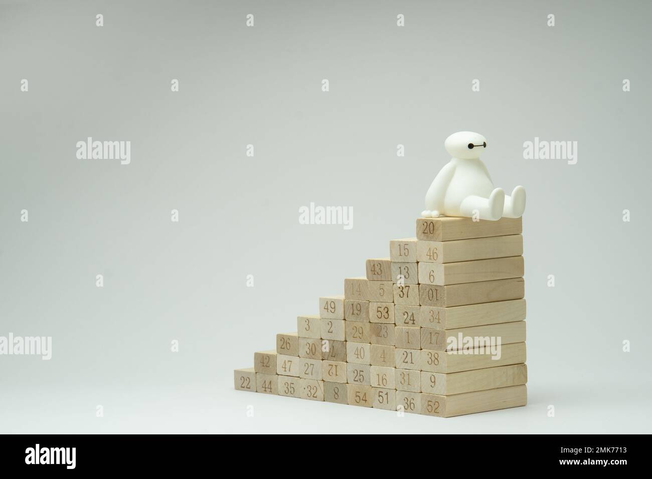 Human sitting on top of stairs white background, concept for growth in ...