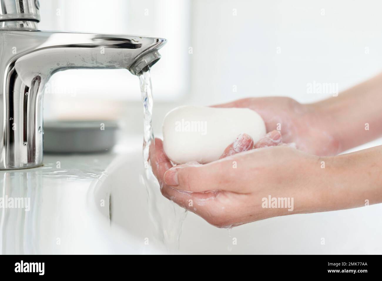 side view hands washing bar soap sink. High resolution photo Stock ...