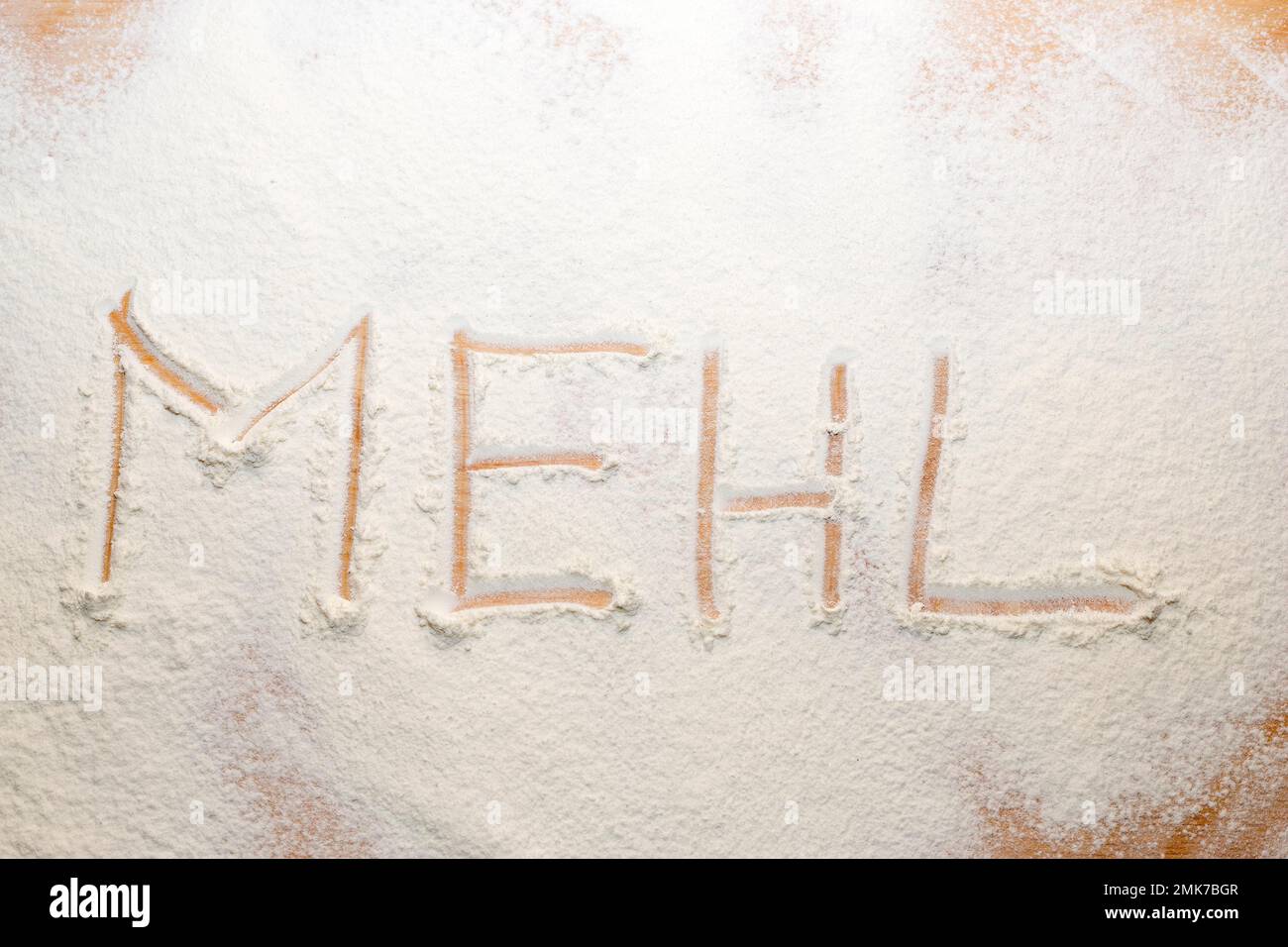 The word flour was written in flour on a pasta board Stock Photo - Alamy
