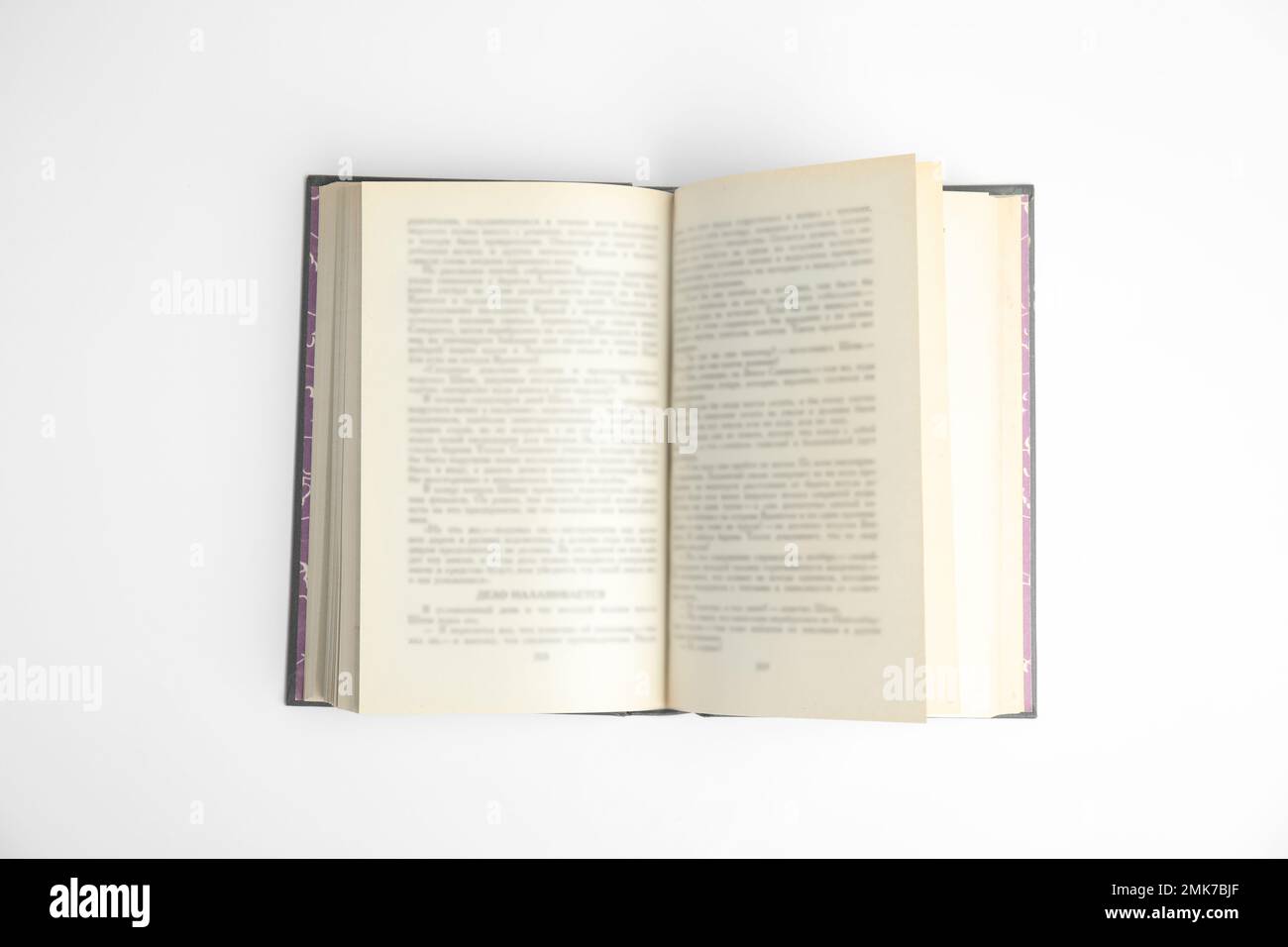 Open book on white background, top view. Space for text Stock Photo - Alamy