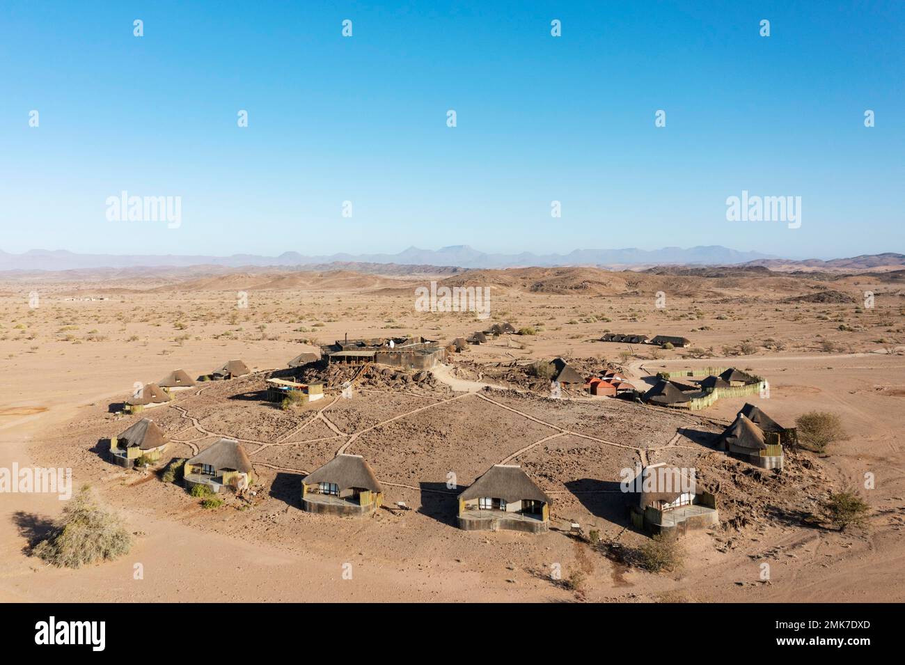 The Doro Nawas Camp and arid desert plains at the edge of the dry river ...