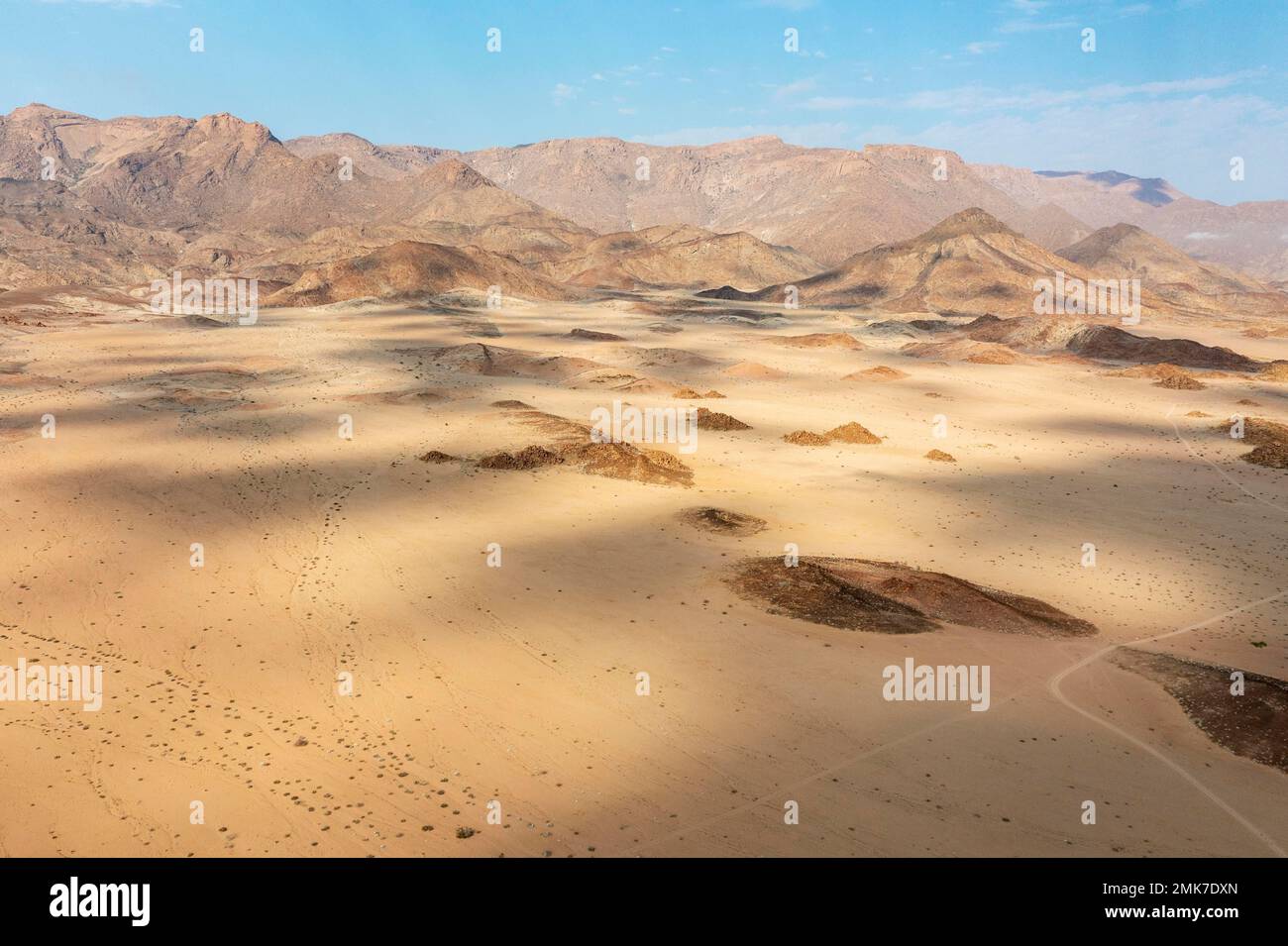 Arid plains and the Brandberg, Namibia's highest mountain, aerial view ...