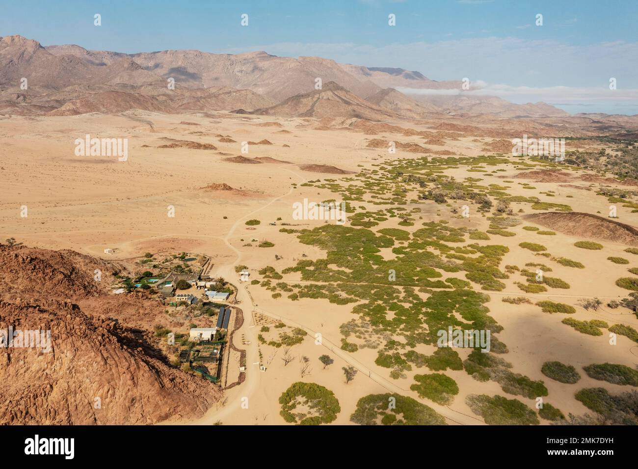 The Brandberg White Lady Lodge at the edge of the dry river bed of the ...