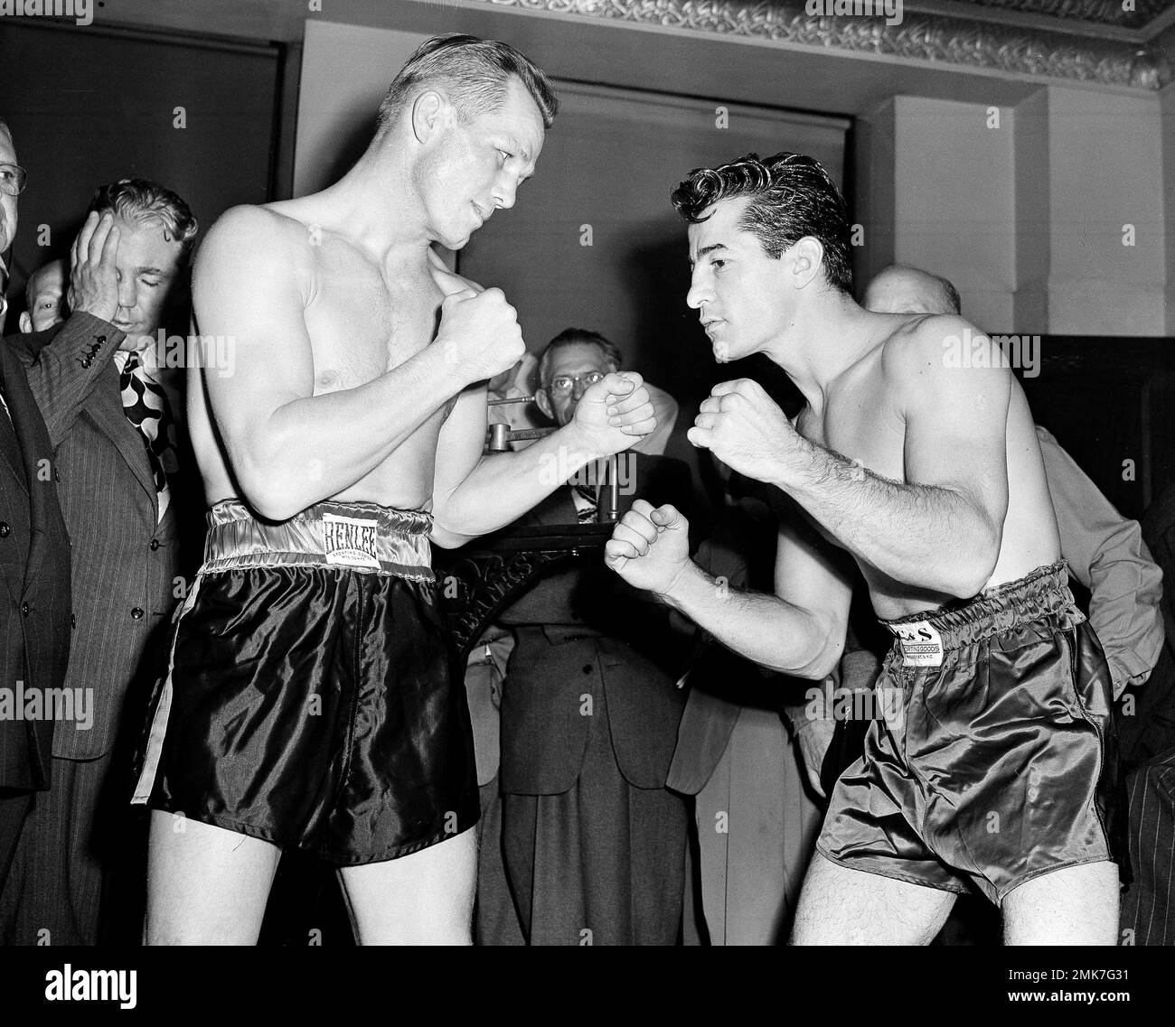 Tony Zale, left, of Gary, Ind., world's middleweight champion, faces ...