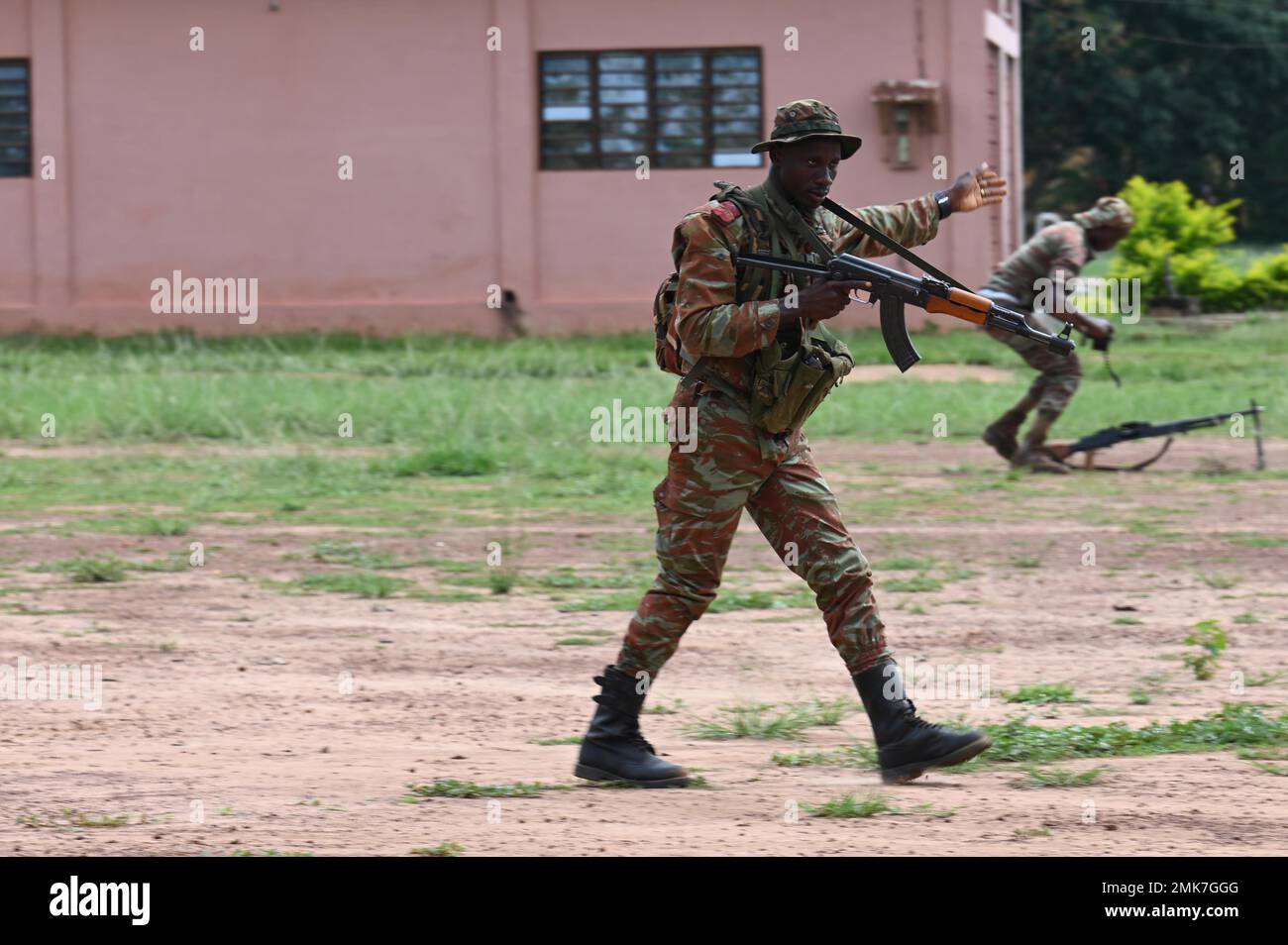 A Beninese soldier from the 1st Commando Parachute Battalion gives a ...