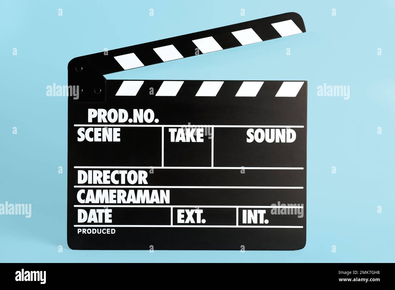 cinema clap on blue background Stock Photo - Alamy