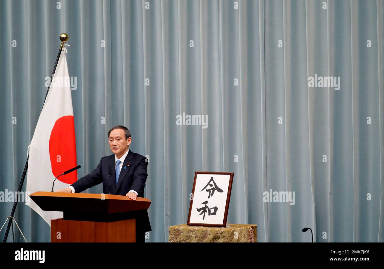 Japan's Chief Cabinet Secretary Yoshihide Suga unveils new era name ...