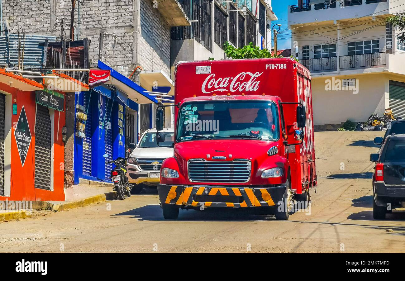 Various Mexican red coca cola coke trucks cargo transporter delivery ...