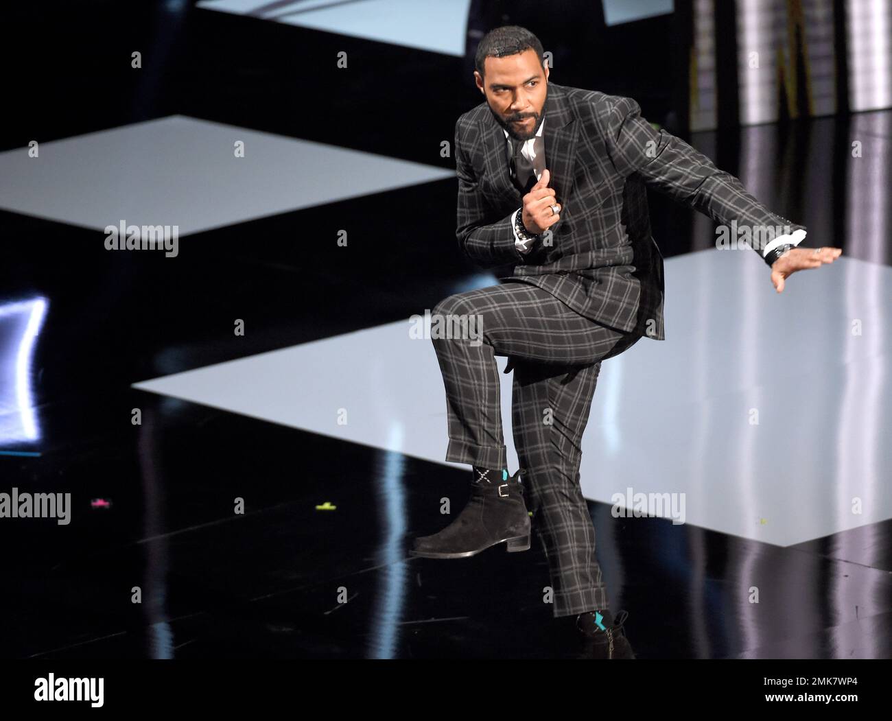 Omari Hardwick gestures as he appears on stage to accept the award for ...