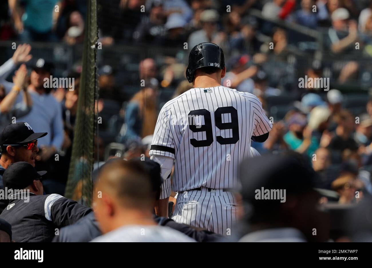 New York Yankees right fielder Aaron Judge (99) steps out of the dugout ...