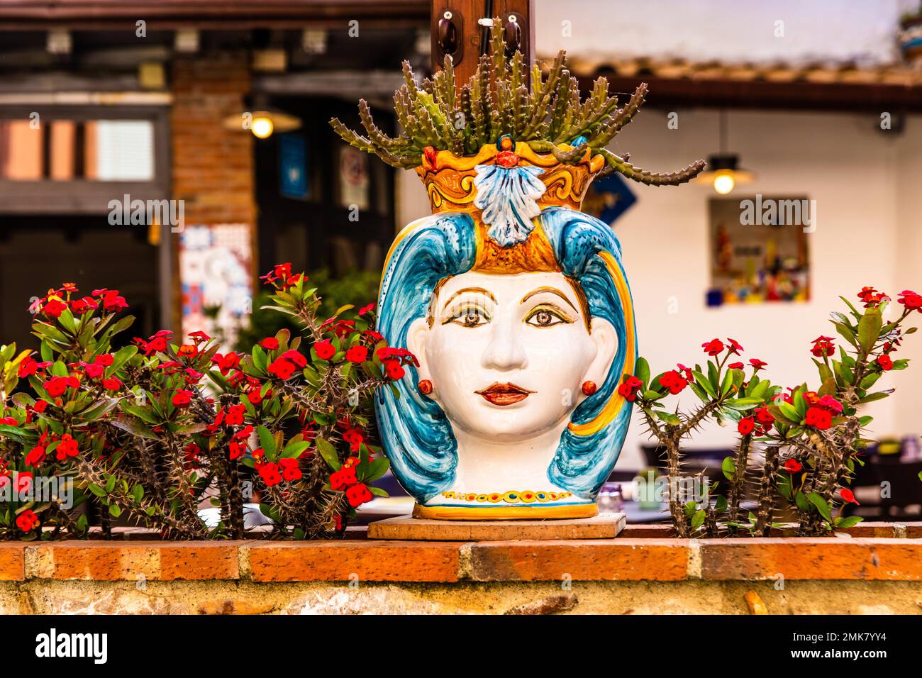 Moorish teracotta, Taormina on a rocky terrace on the slope of Monte ...