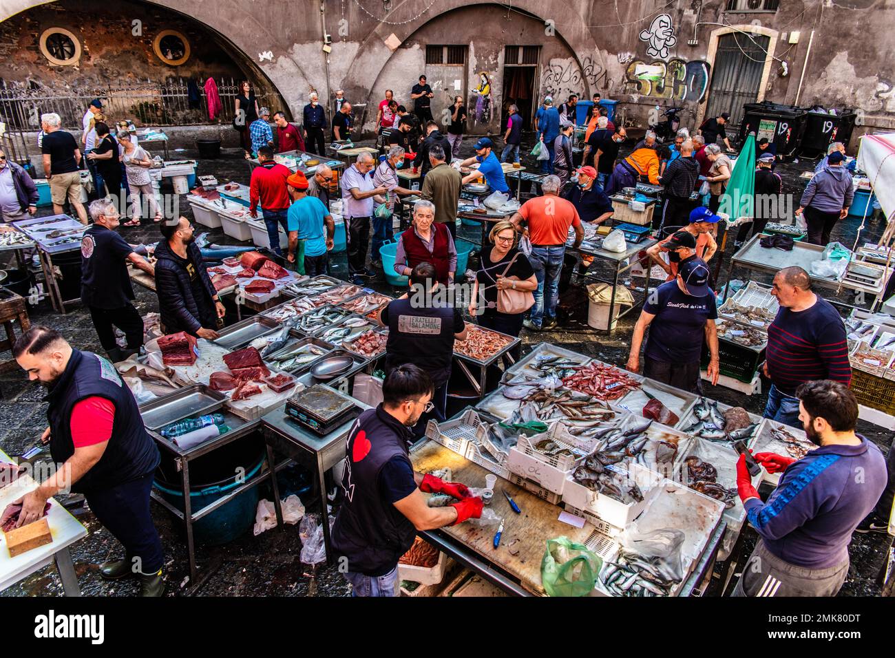 Historic fish market La pescheria with a cornucopia of colourful sea ...