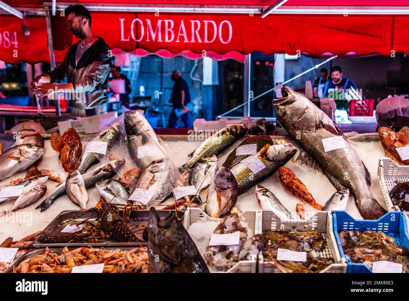Historic fish market La pescheria with a cornucopia of colourful sea ...