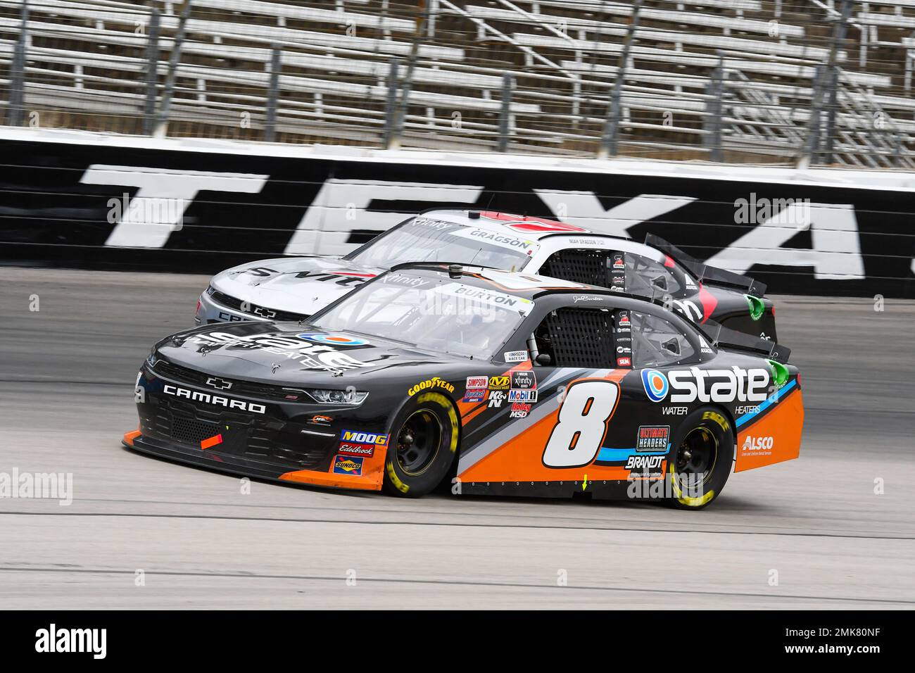 Drivers Jeb Burton (8) and Noah Gragson, background, battle for ...