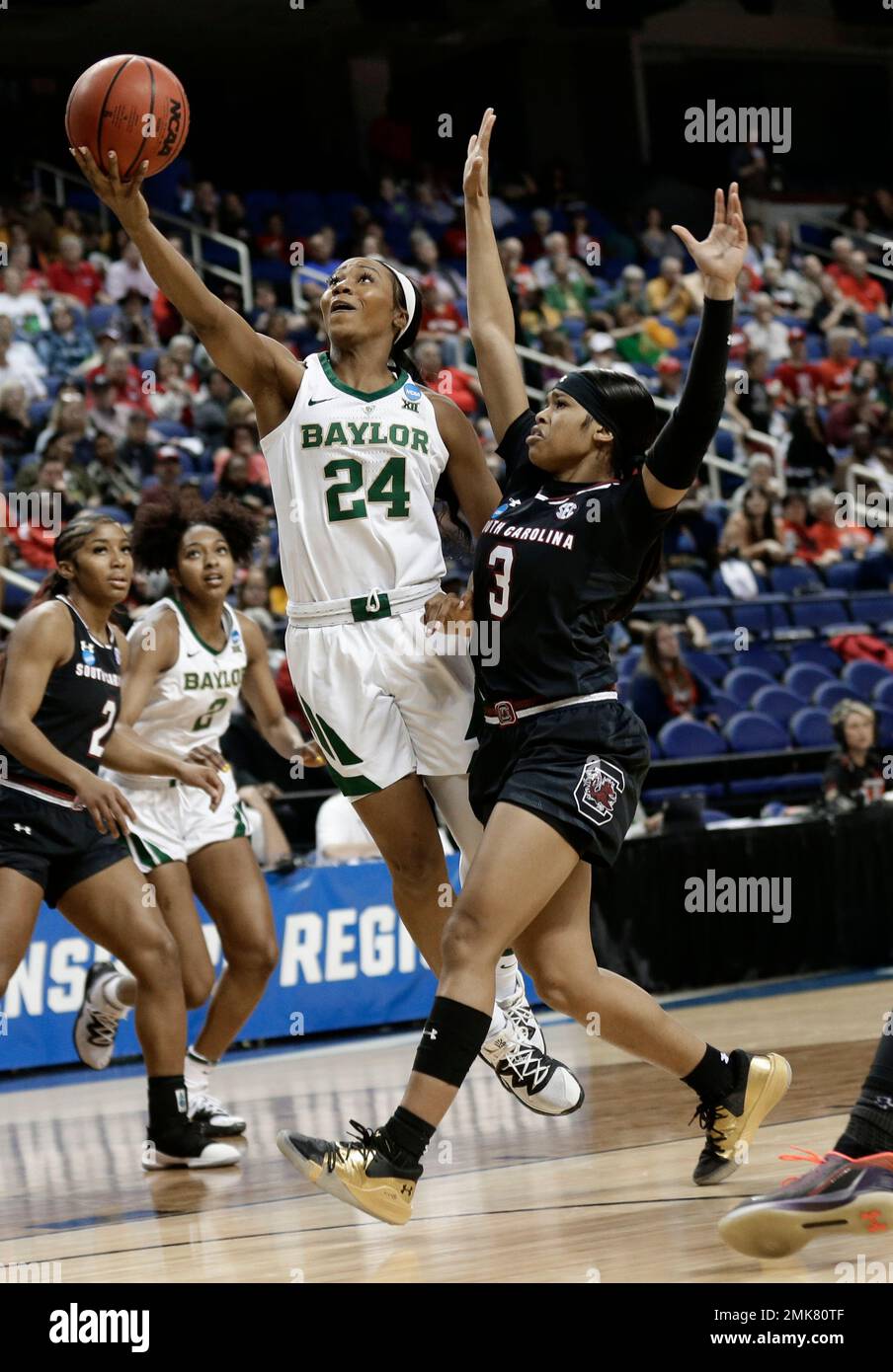 Baylor's Chloe Jackson (24) drives against South Carolina's Destanni ...