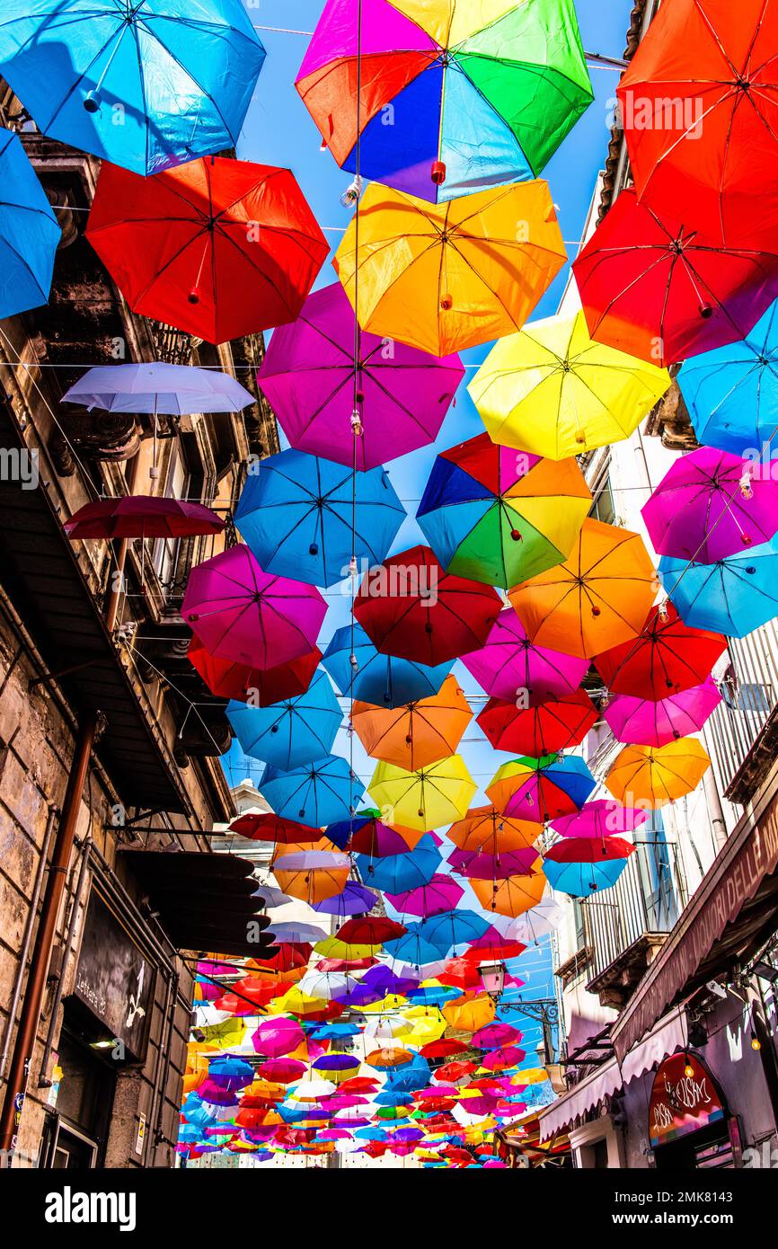 Coloured umbrellas as a roof at the historic fish market La pescheria ...
