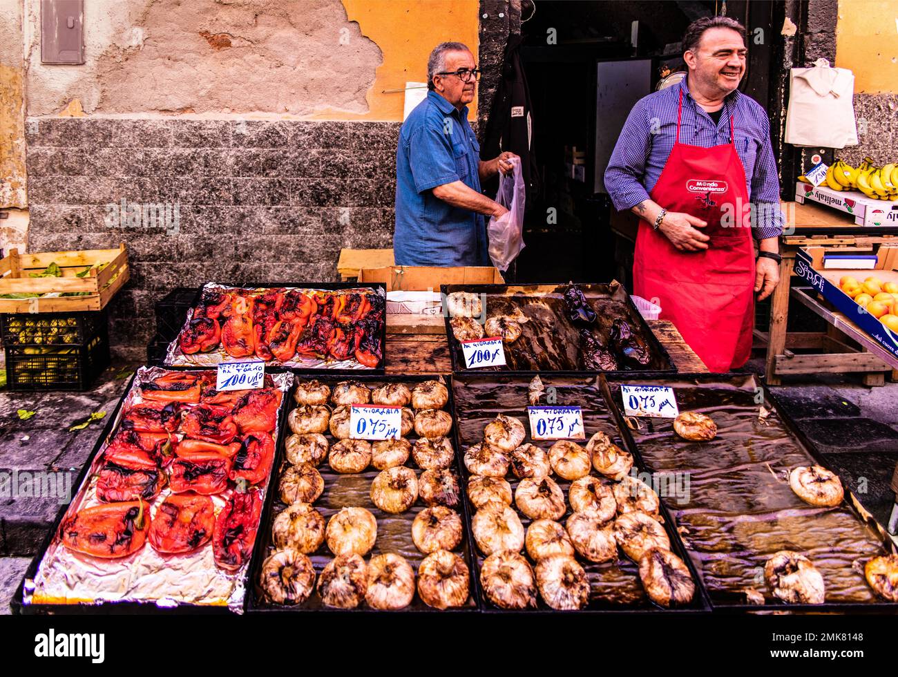 Vegetable stall at the historic fish market La pescheria with an ...