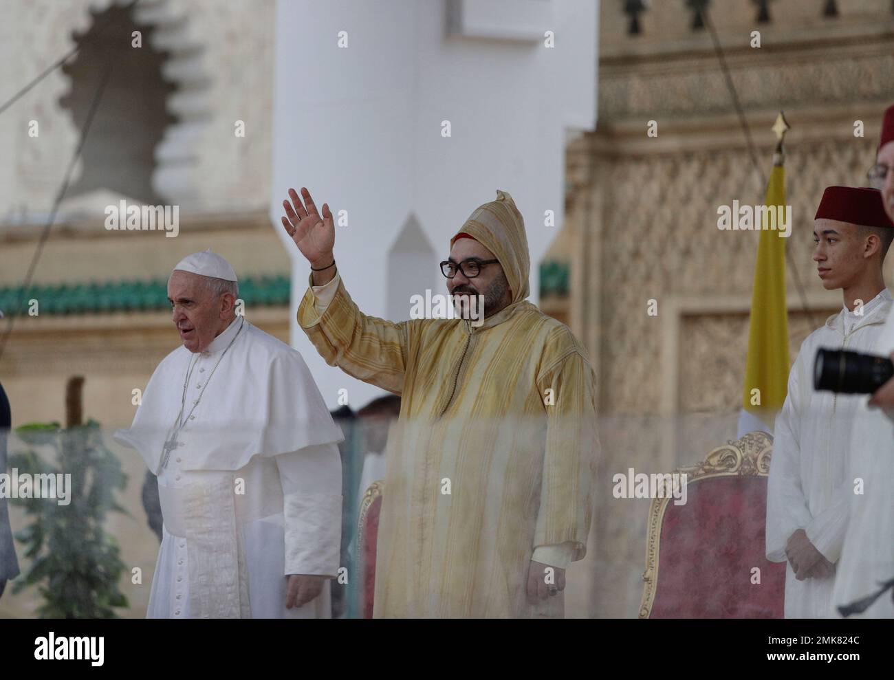 Pope Francis is flanked by Moroccan King Mohammed VI, in Rabat, Morocco ...