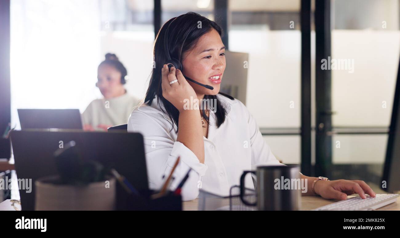 Asian female call center headset hi-res stock photography and images ...