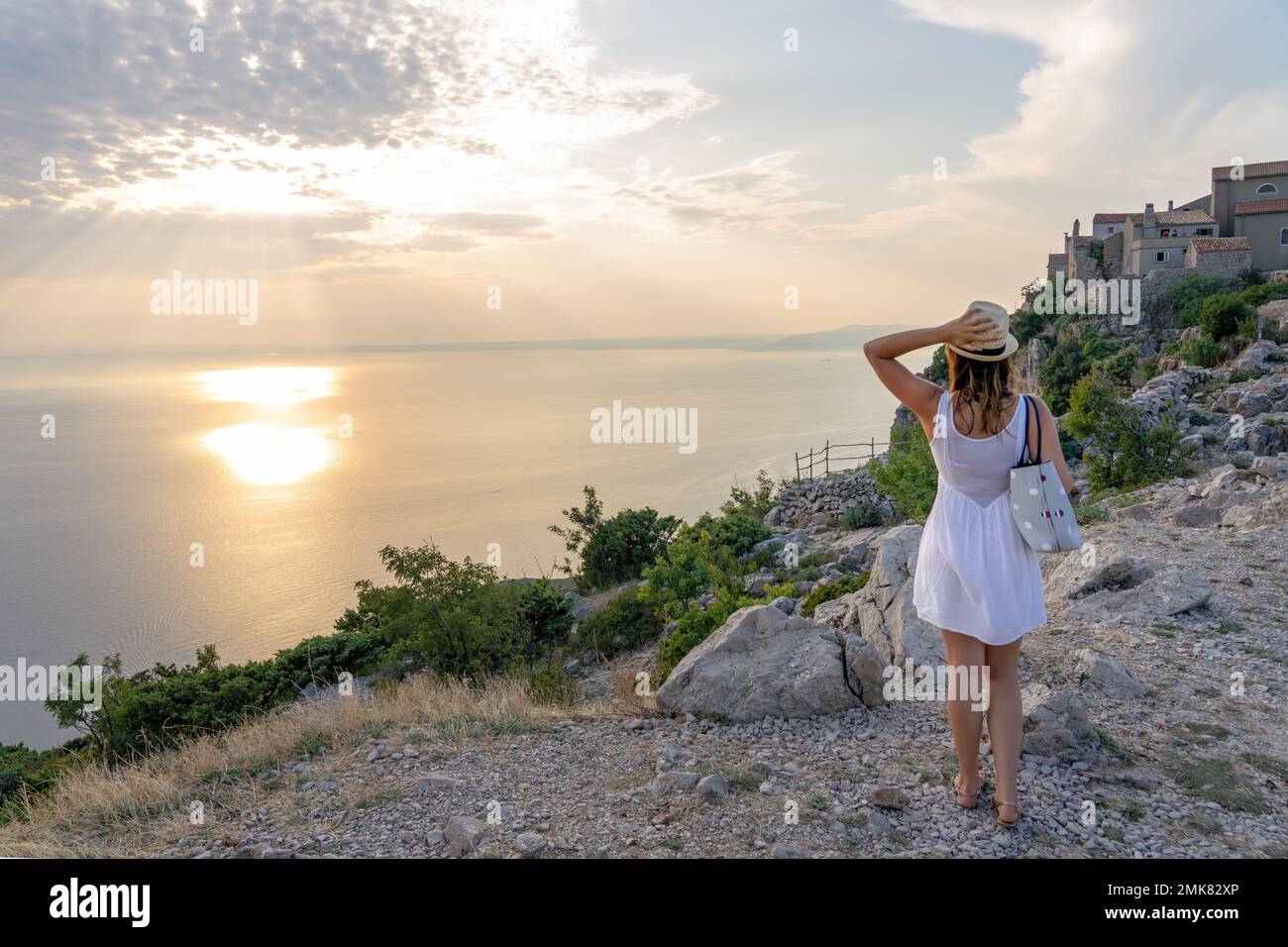 The famous Lubenice village at sunset over the sea in Cres island ...