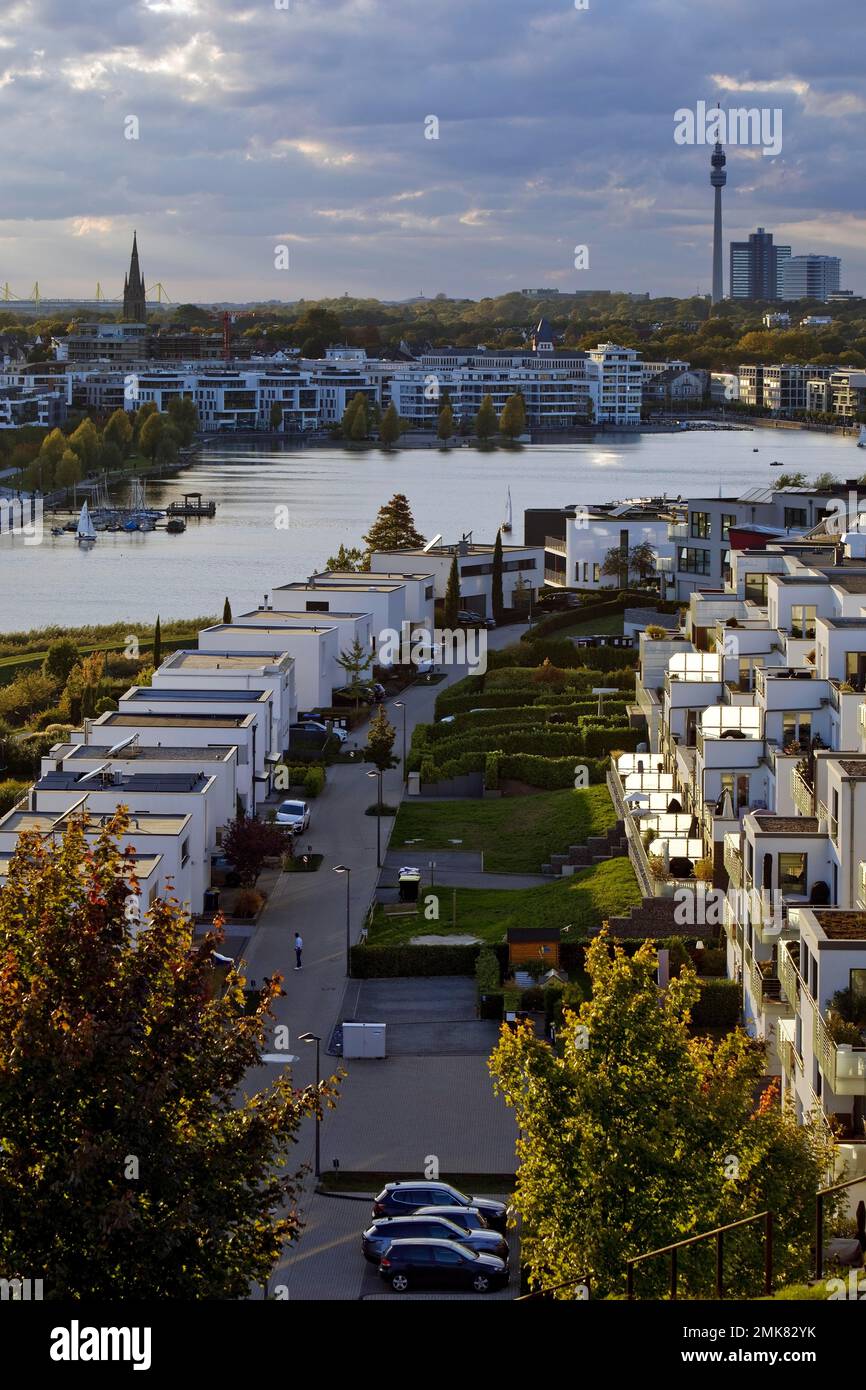 Residential development at Phoenix Lake with the city silouhette in the ...