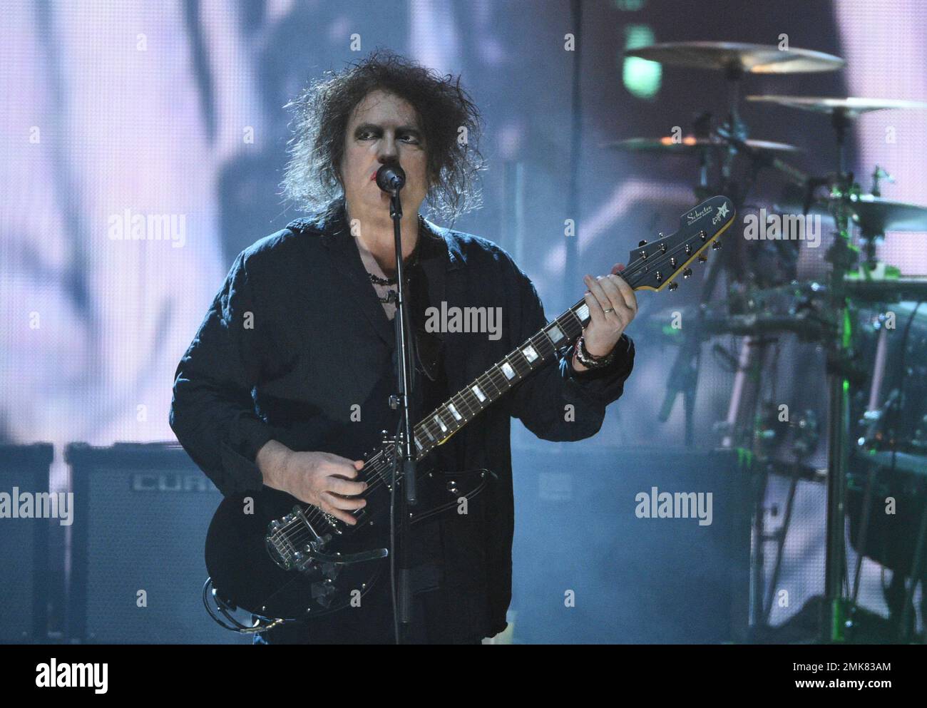 Inductee Robert Smith, of The Cure, performs at the Rock & Roll Hall of ...