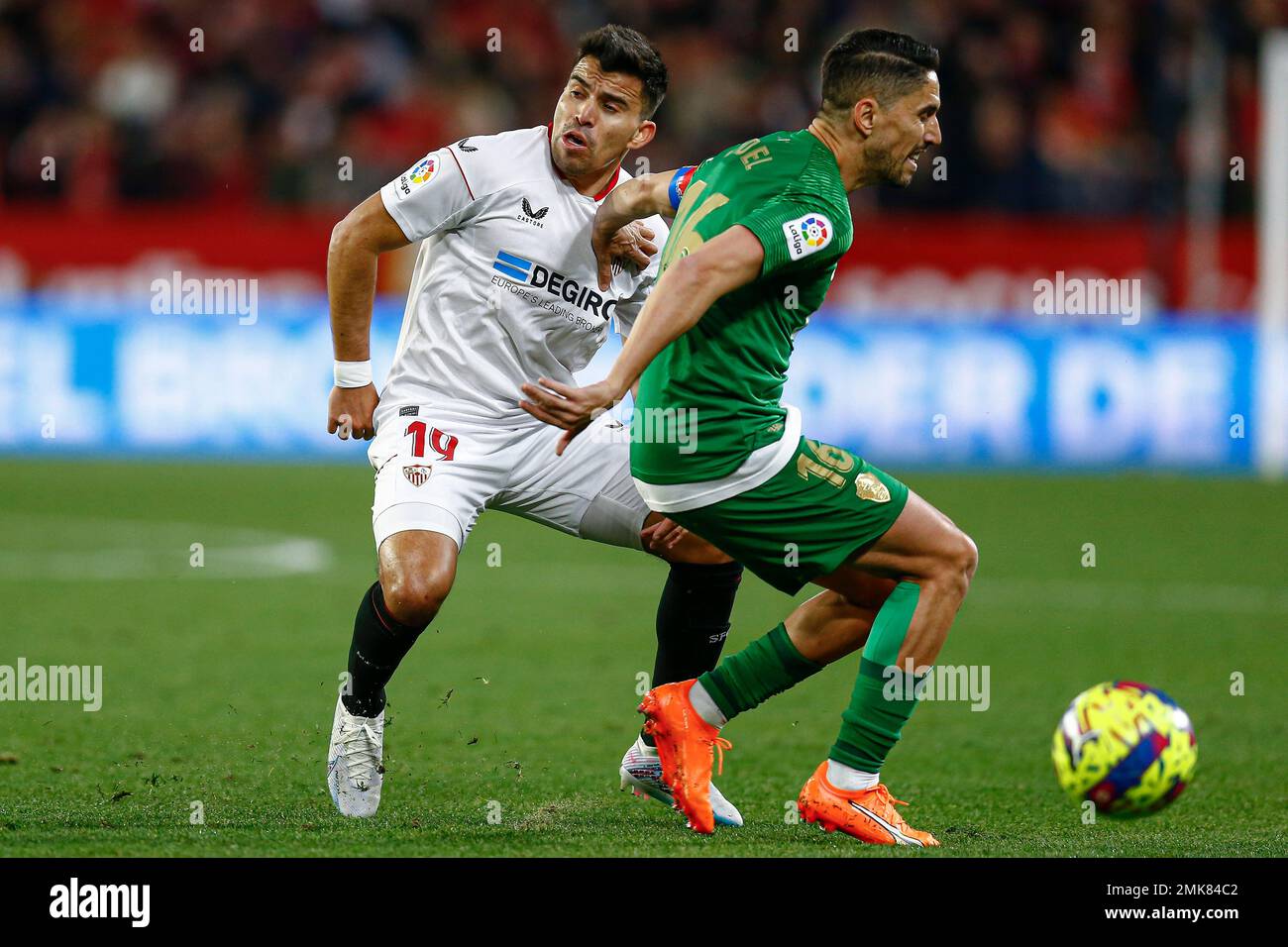 Marcos Acuna of Sevilla FC and Fidel Chaves of Elche CF during the La ...