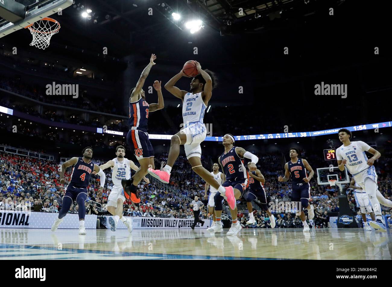 North Carolina's Coby White (2) heads to the basket during the first ...