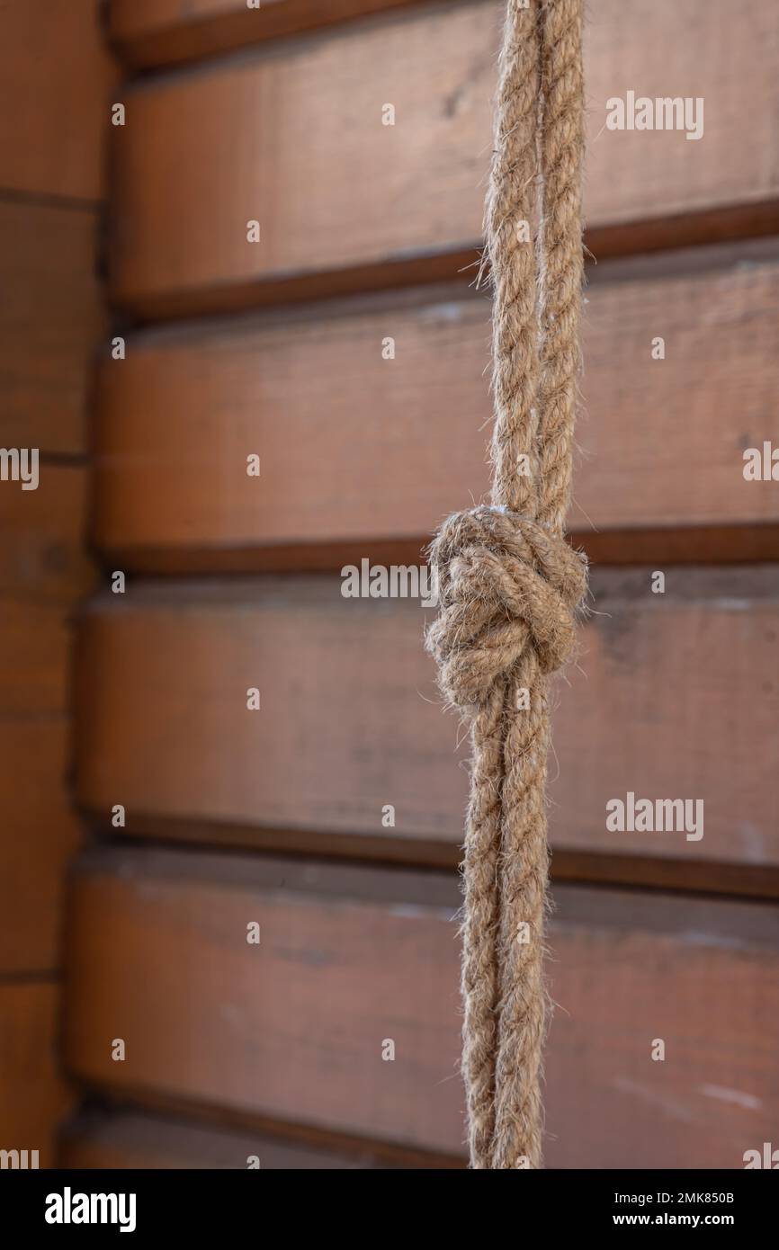 Bow knot made of linen rope string isolated over the background Stock ...