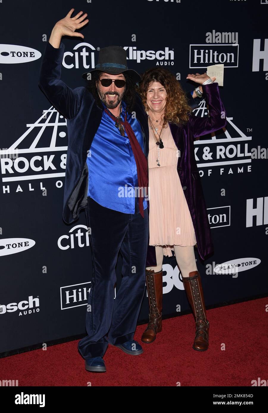 Mike Campbell, left, and Marcie Campbell arrive at the Rock & Roll Hall ...