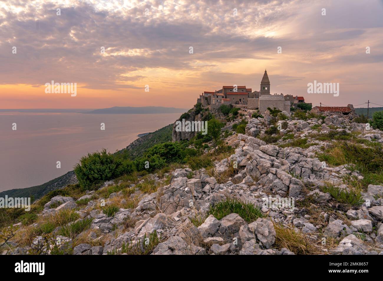 Lubenice on the mountain with the adriatic sea in Croatia at sunset ...