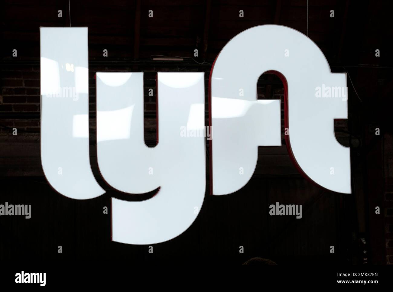 A sign for Lyft is displayed in Los Angeles, Friday, March 29, 2019. On ...