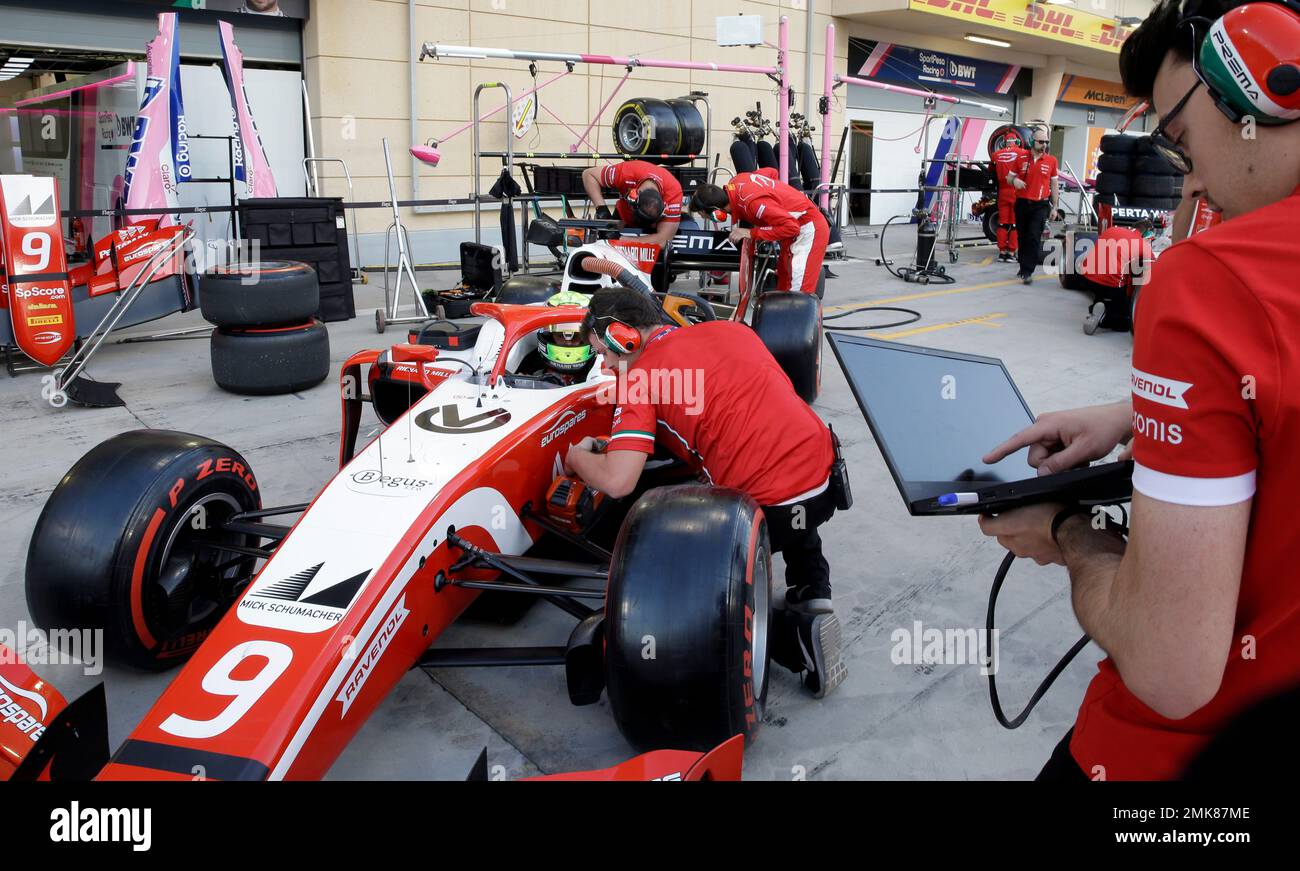 Mechanics work on the Formula 2 Prema racing team car driven by Mick ...